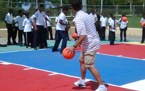 Dominican basketball star Ivan Almonte plays ball with the boys of the ...
